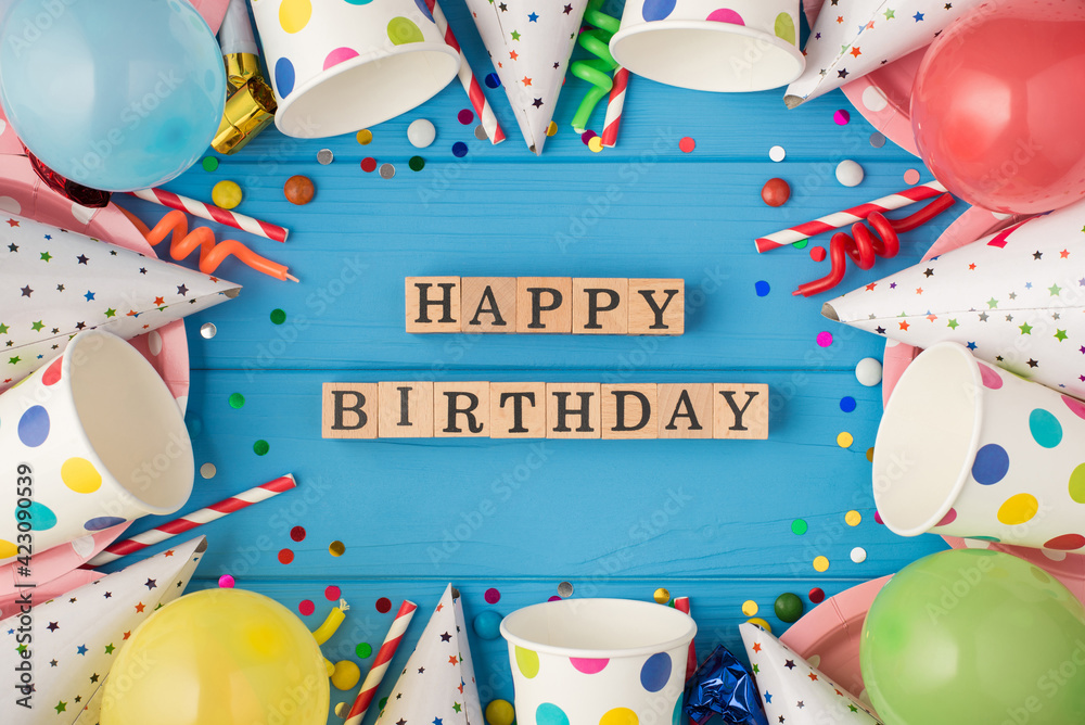 Top view photo of birthday composition wooden cubes labeled happy ...