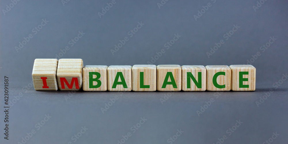 Balance or imbalance symbol. Turned cubes and changed the word ...