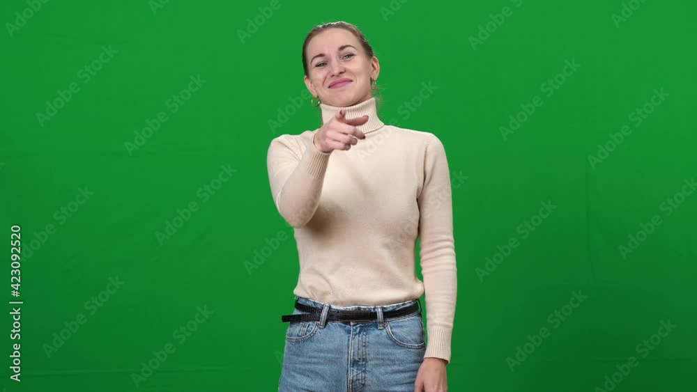 Woman mocking pointing at camera and laughing. portrait of young rude ...
