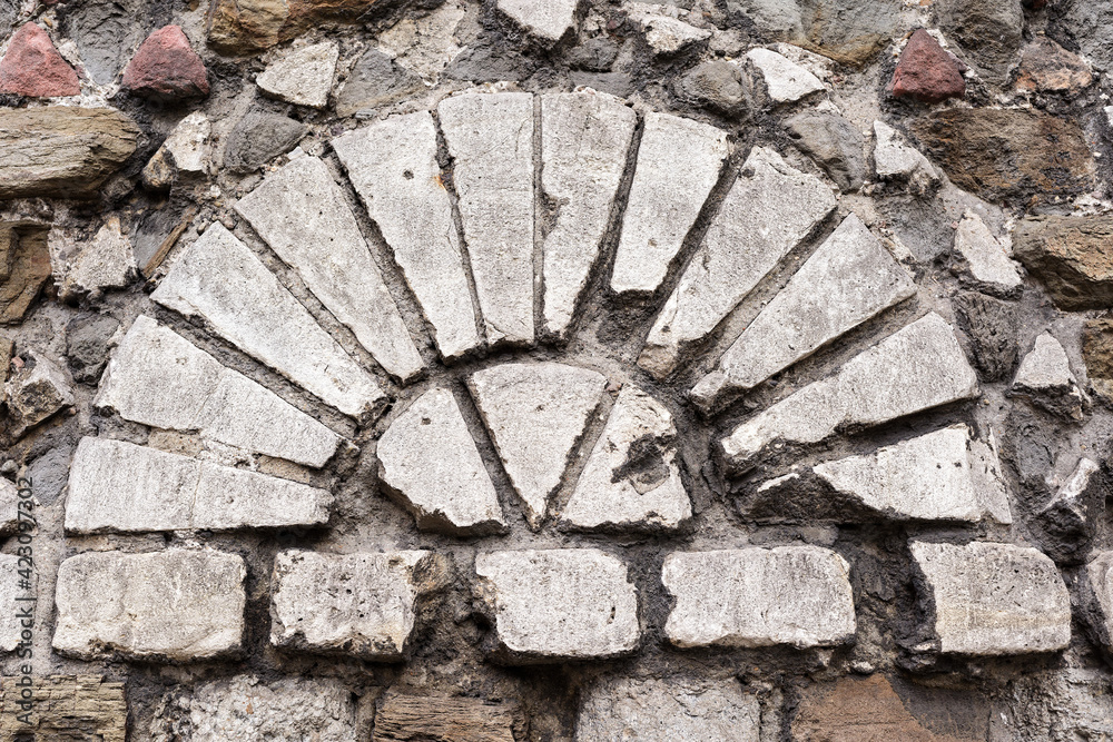 details with decorations of a historical roman wall in the old town of ...