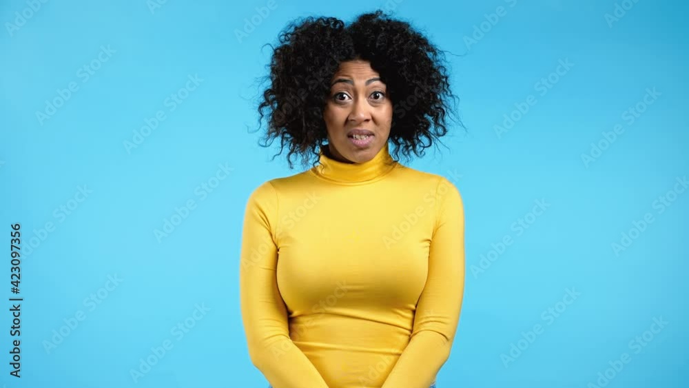 Guilty confused african woman making oops, im sorry expression. Girl is ...