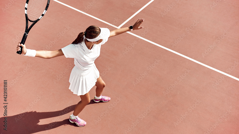 Pretty Girl Plays Tennis On The Court Outdoors She Prepares To Beat On