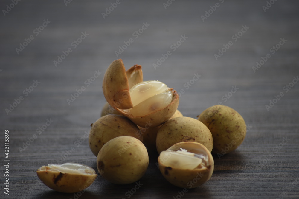 Lansium parasiticum, commonly known as langsat or longkong in English ...