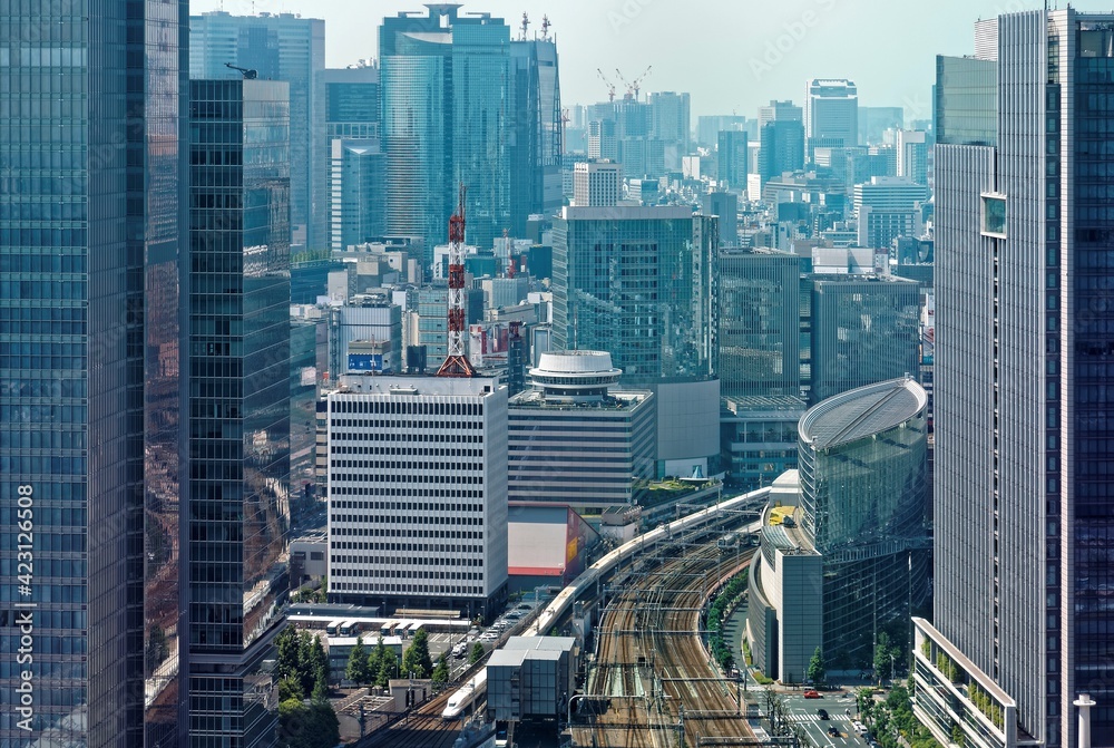 Morning scenery of Tokyo Train Station, with view of a High-Speed ...