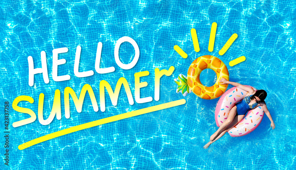Aerial. Hello Summer concept with a woman in a swimming pool on the ...