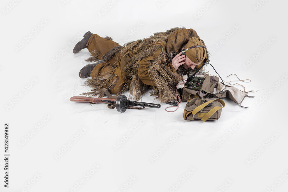 Man soldier radio operator of the Soviet army in old military uniform ...