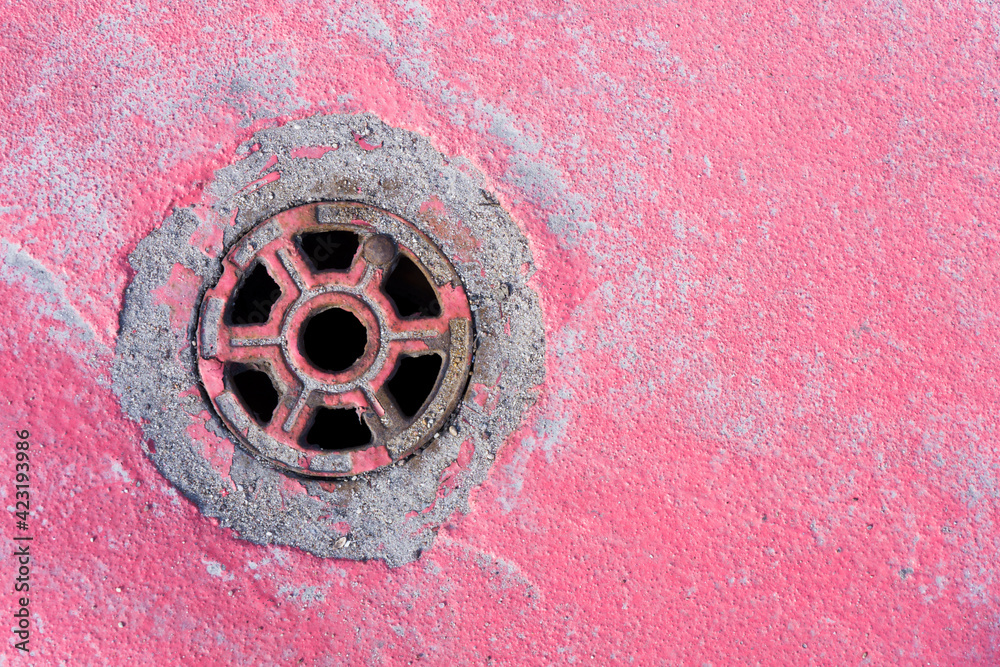 Round manhole on concrete drain system cover. Urban sewer background ...