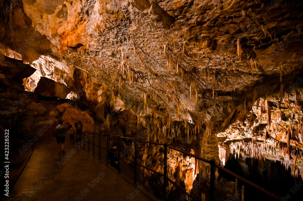 Trails inside the Postojna cave park. It is the second-longest cave ...