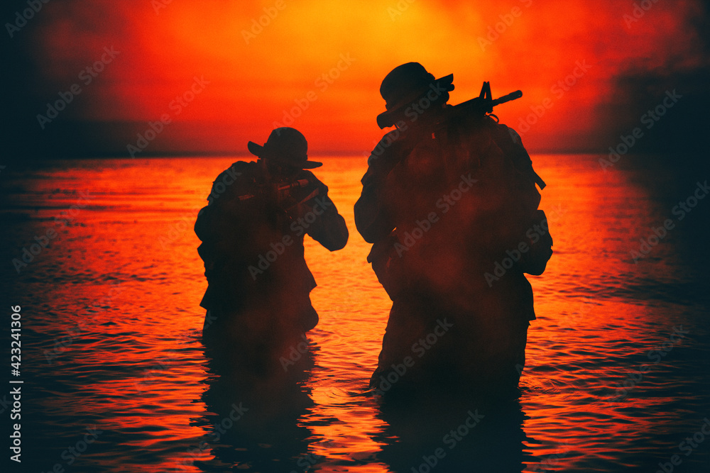 Commando soldiers walking in water, army special operations forces ...