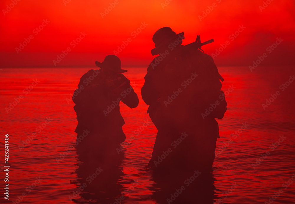 Commando soldiers walking in water, army special operations forces ...