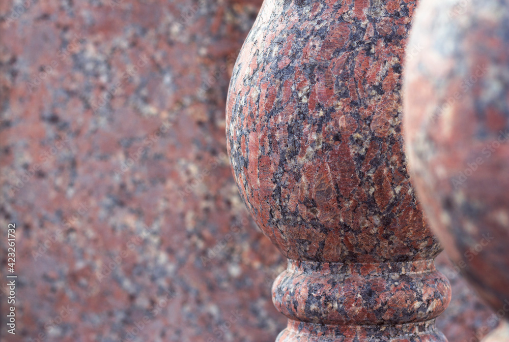 Red granite stone textured balusters. City surface background ...
