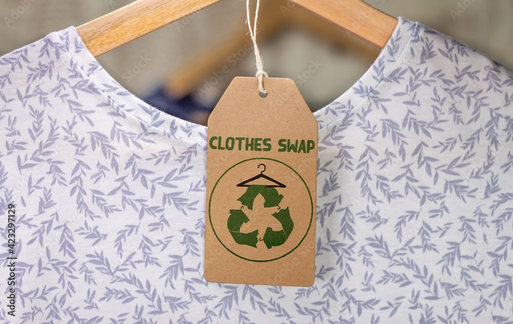 Clothes Swap and recycle clothes icon on label on t shirt, sustainable ...