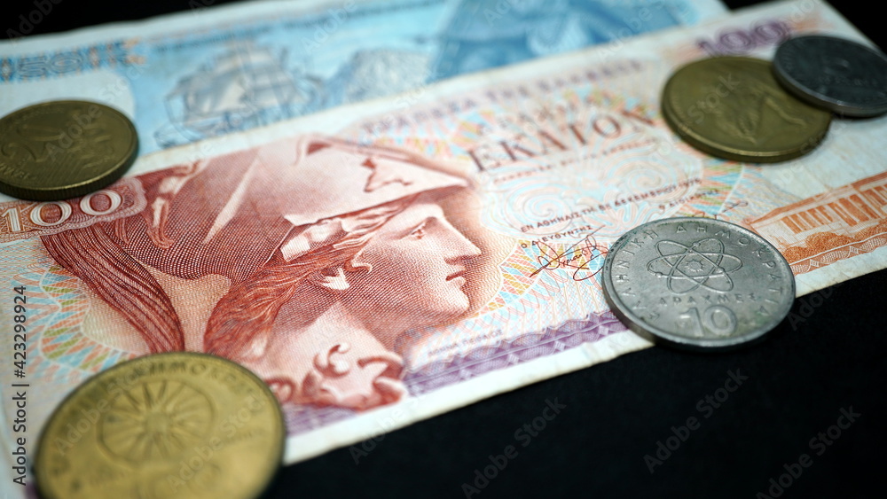 Banknotes and drachma coins. name of a coin of ancient Greece, taken up ...