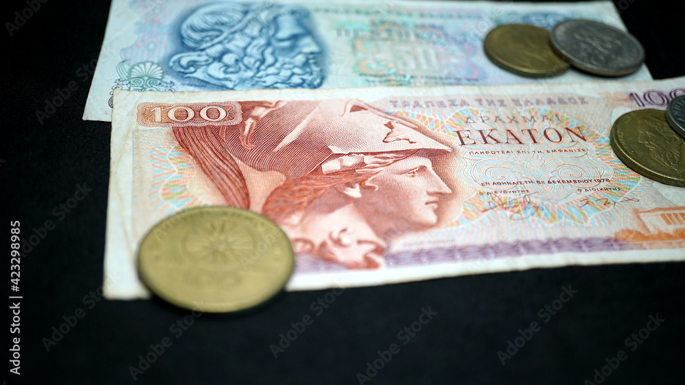 Banknotes and drachma coins. name of a coin of ancient Greece, taken up ...
