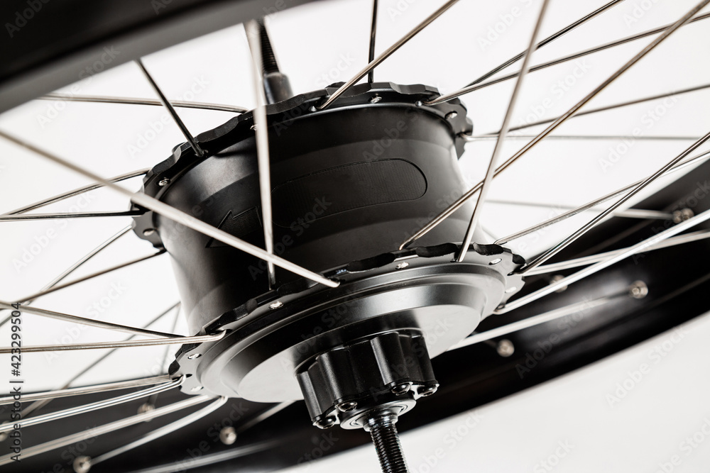 Electric motor close-up. The fat bike's thick wheel. Stock Photo ...