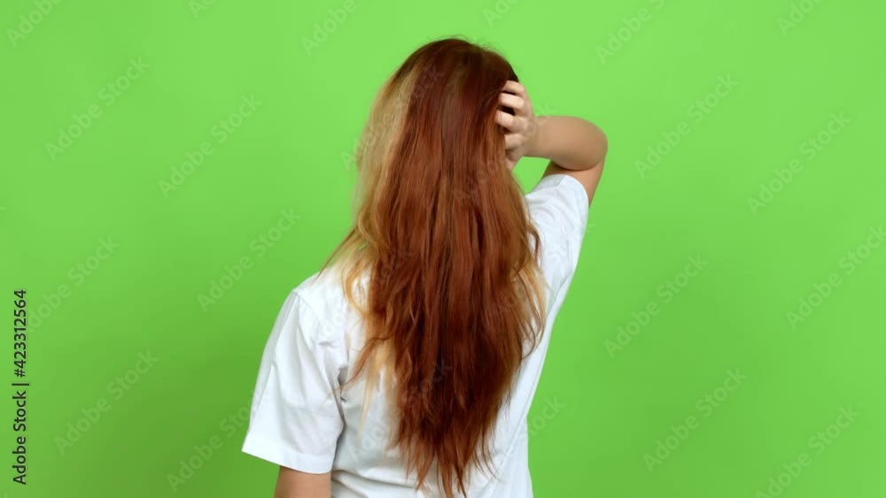 Young blonde teenager girl with stewardess uniform on back position ...