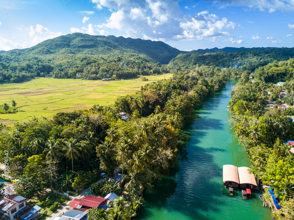 Aerial of the emerald green colored Loboc river in Bohol, Philippines ...