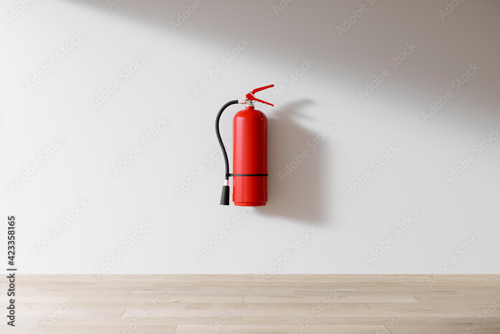 Red fire extinguisher isolated indoors on the wall, personal fire ...