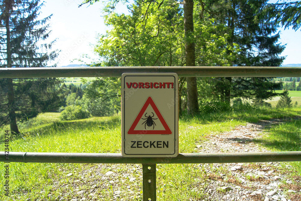 A German sign showing "Vorsicht Zecken!" - means in English "Danger ...