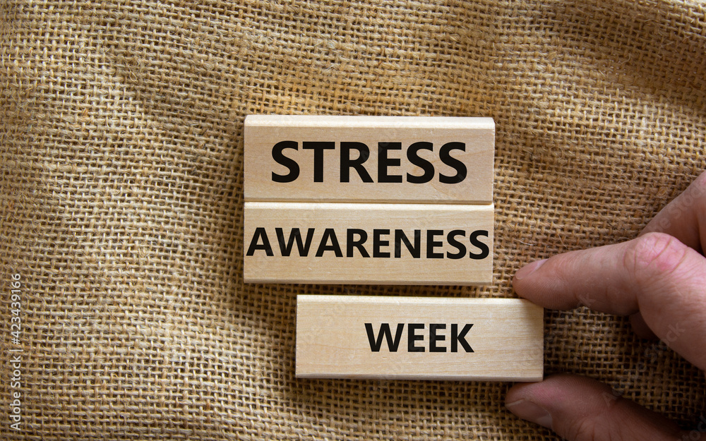 Stress awareness week symbol. Wooden blocks with words 'Stress ...