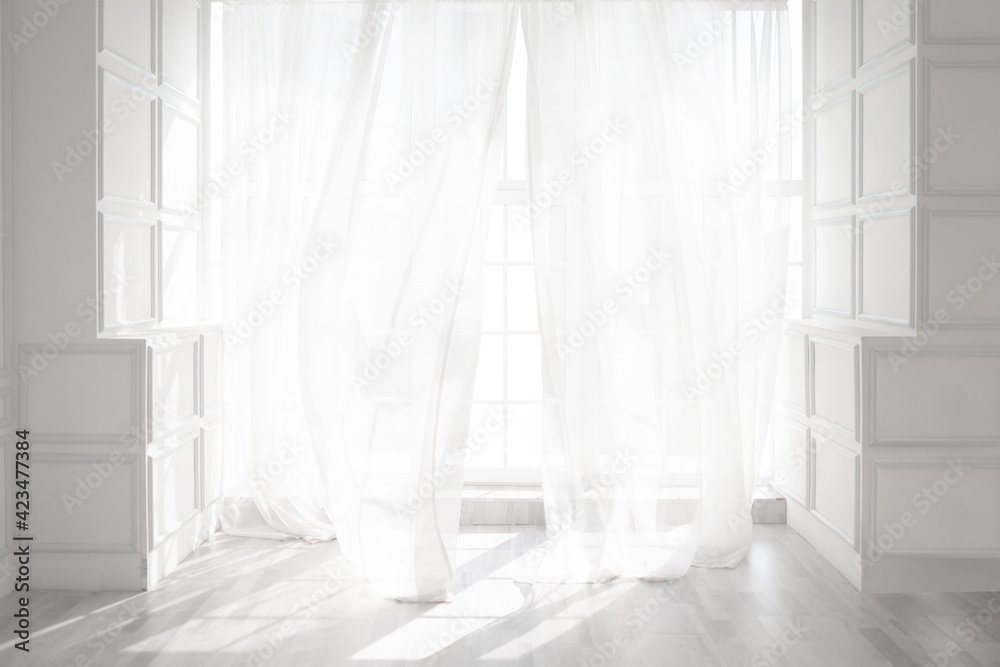 Backlit window with white curtains in empty room Stock Photo | Adobe Stock