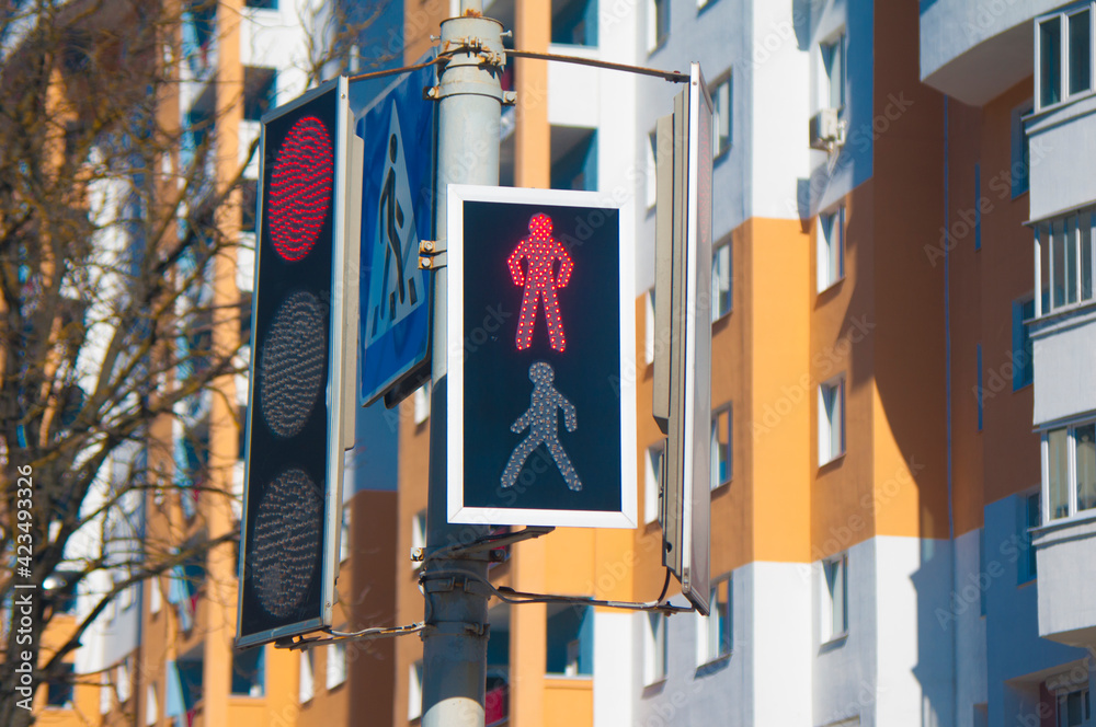 Foto de road signs on city streets, traffic lights with a green signal ...