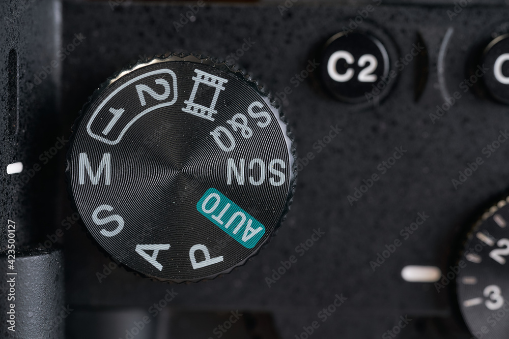 Digital photo camera. View of the wheel of choice of shooting mode ...