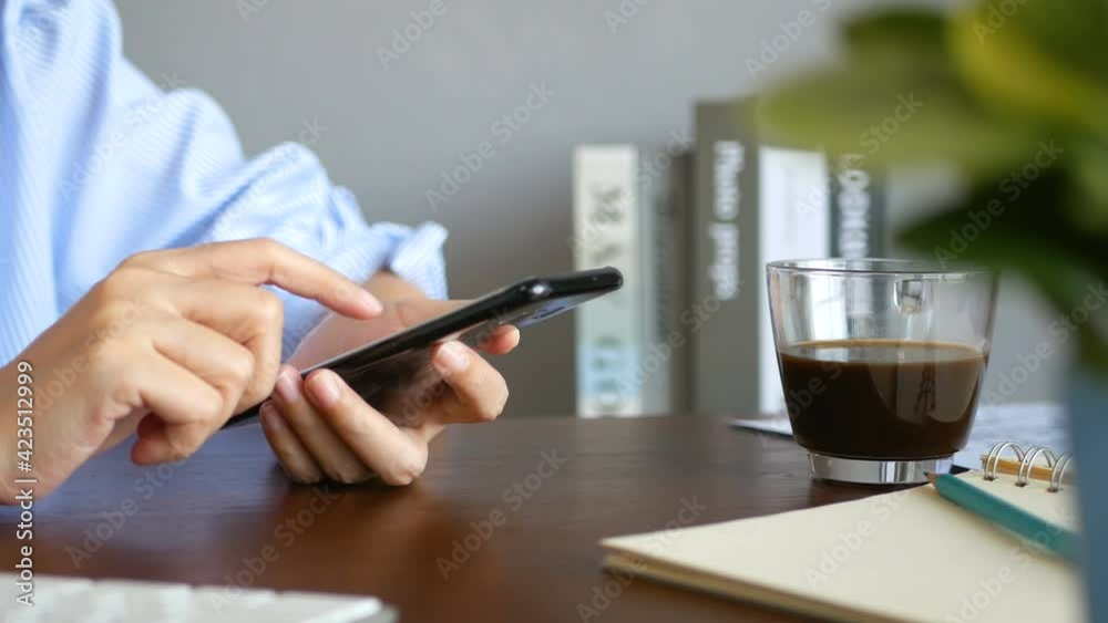 4k. side view of young woman using mobile smart phone surfing social ...