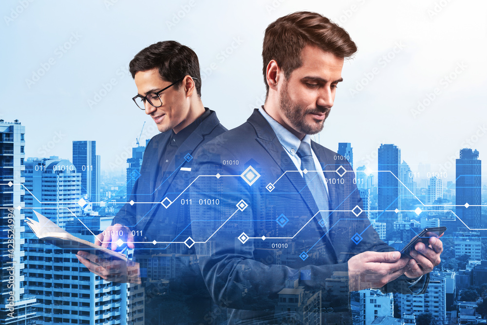 Two handsome businessman working on technology at business process to ...