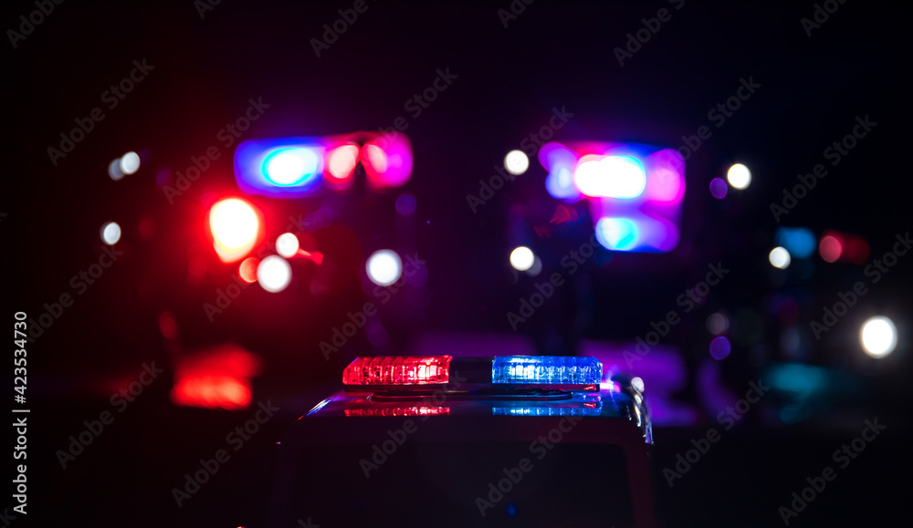 Police cars at night. Police car chasing a car at night with fog ...