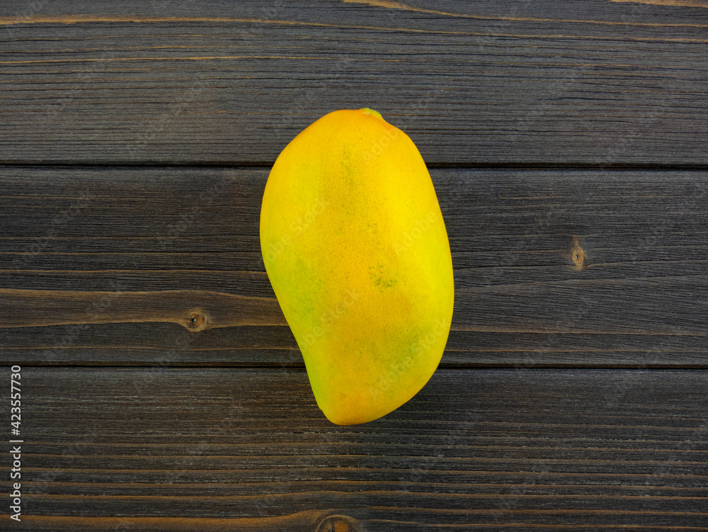 One Mango still life, Nam Dok Mai on the table top view, flat lay fruit ...