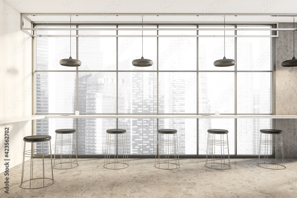 Light cafe interior with many seats and long table along wall and ...