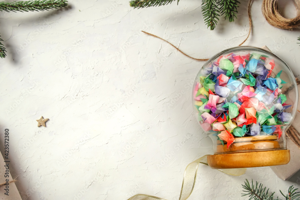 Fold paper of different colors in a glass jar origami in the jar. gift ...