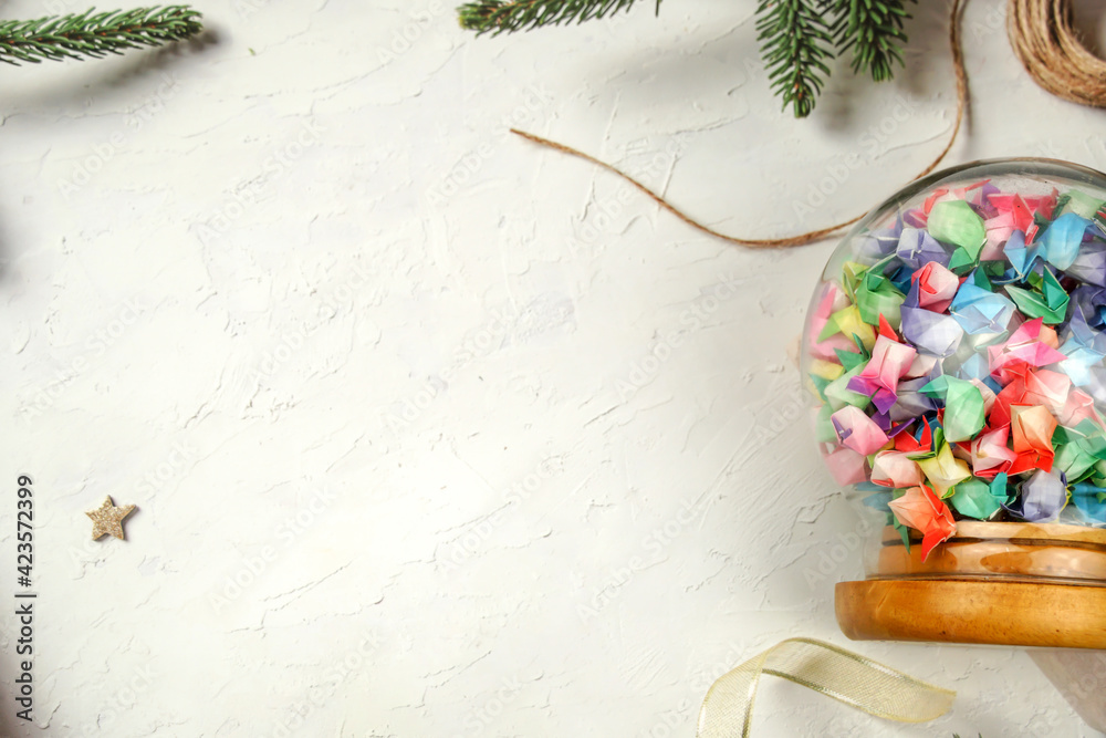 Fold paper of different colors in a glass jar origami in the jar. gift ...