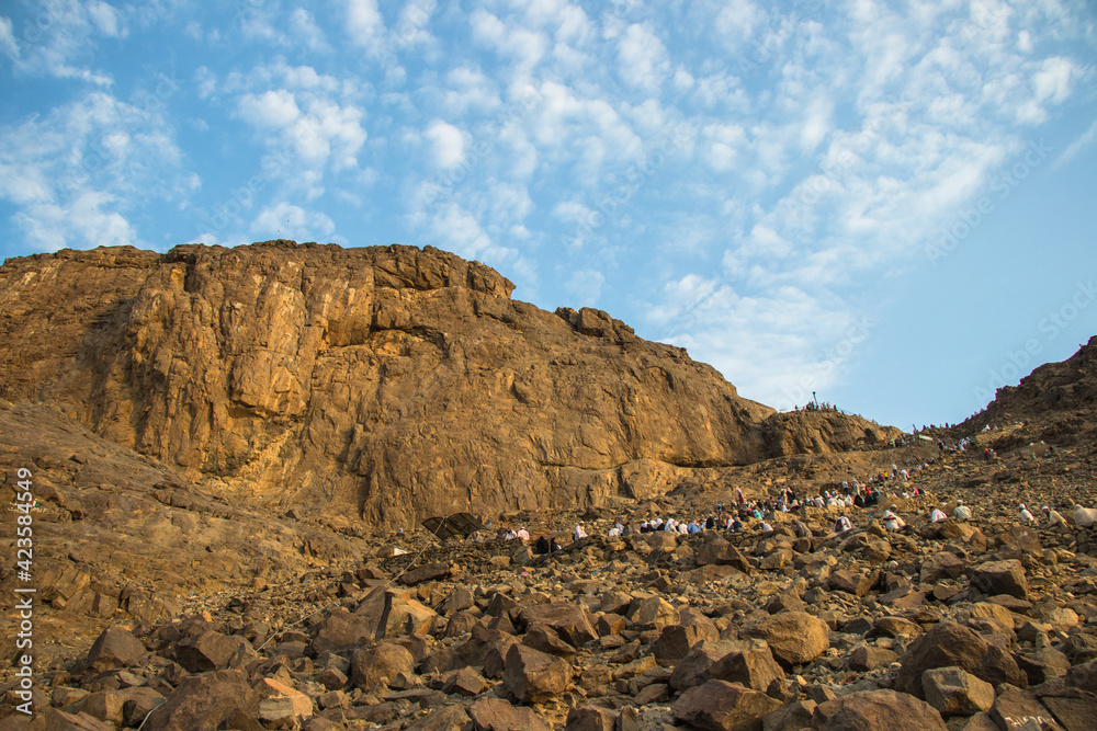 Muslim pilgrims climb the Mount of light "Jabal An-Nour" where located ...