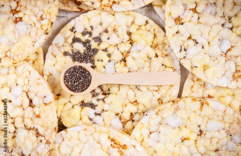 Puffed rice or corn waffles and chia seeds, healthy nutrition concept ...