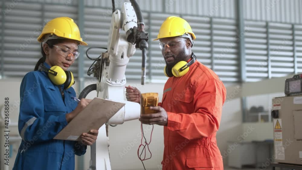 engineer cooperation male and female technician maintenance control ...