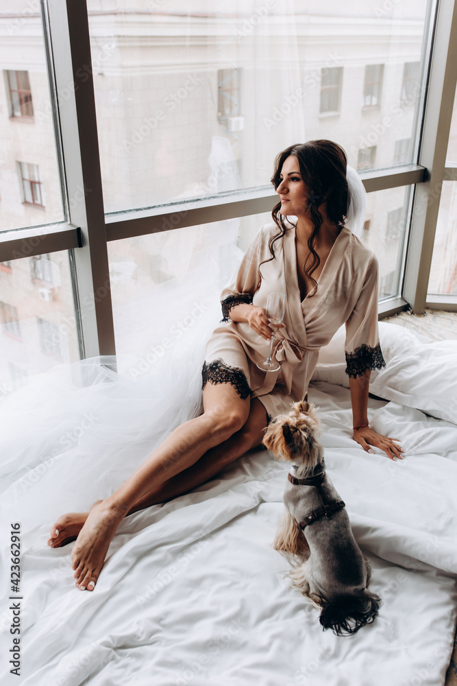 Morning of the bride. The girl in the robe. Glamorous photo session by ...
