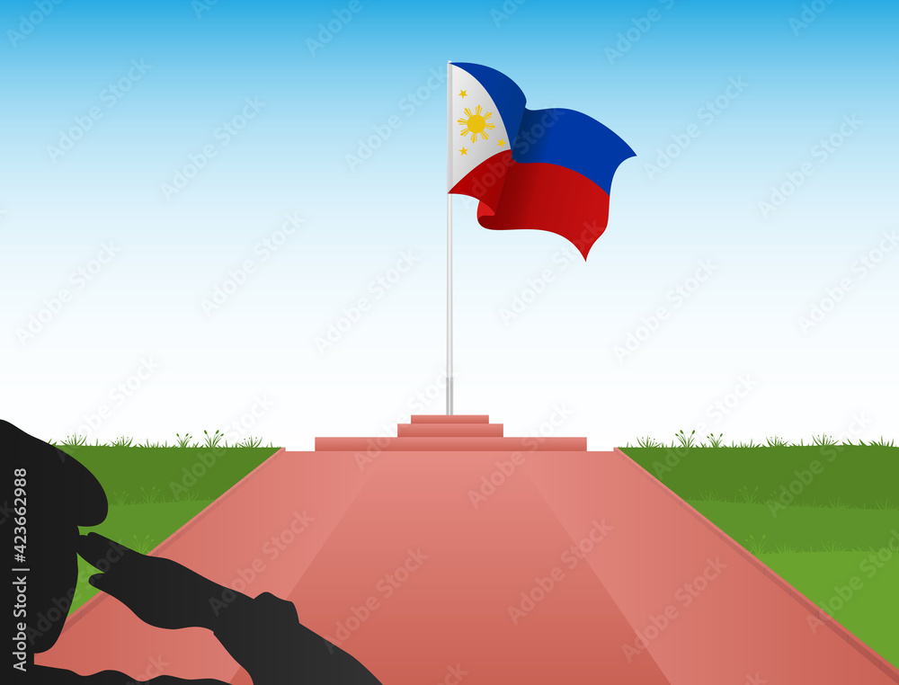 Philippine flag on a pole with the image of a soldier saluting the flag ...
