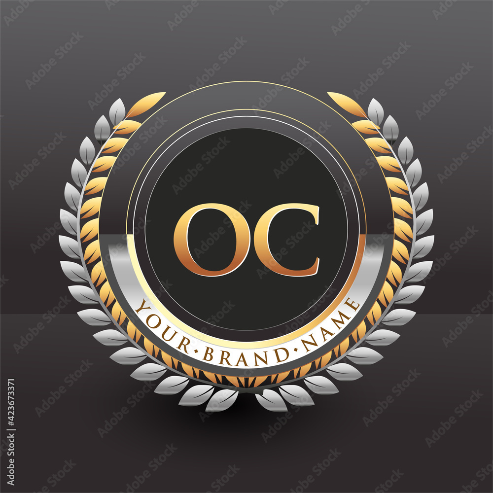 Initial logo letter OC with golden and silver color with laurel and ...