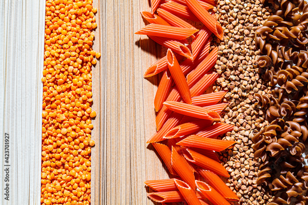 Different types of pasta background. Raw noodles and spaghetti from ...