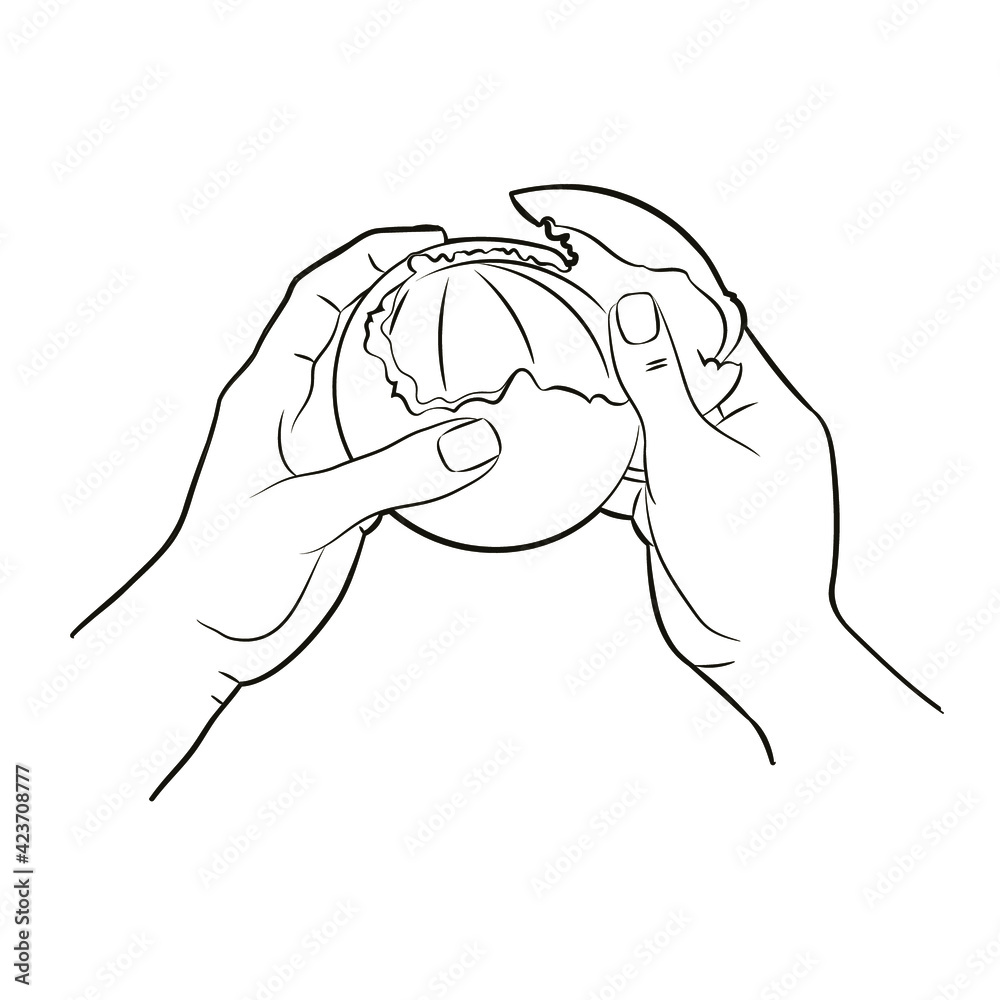 Hands peel an orange by removing the orange peel from the pulp, top ...