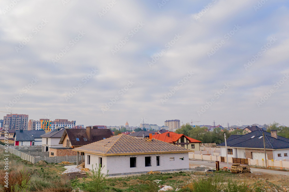 Residential house with wooden roof frame structure under construction ...