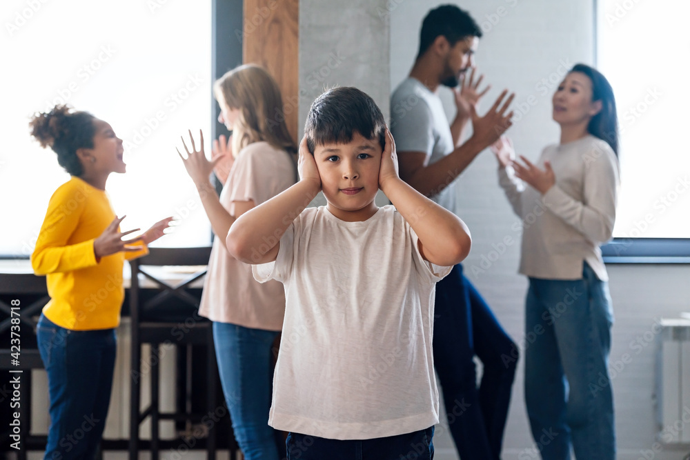 Sad and depressed children are victims of parents fight and conflict ...