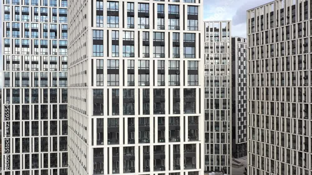 Bottom view of office building window close up, reflection and ...