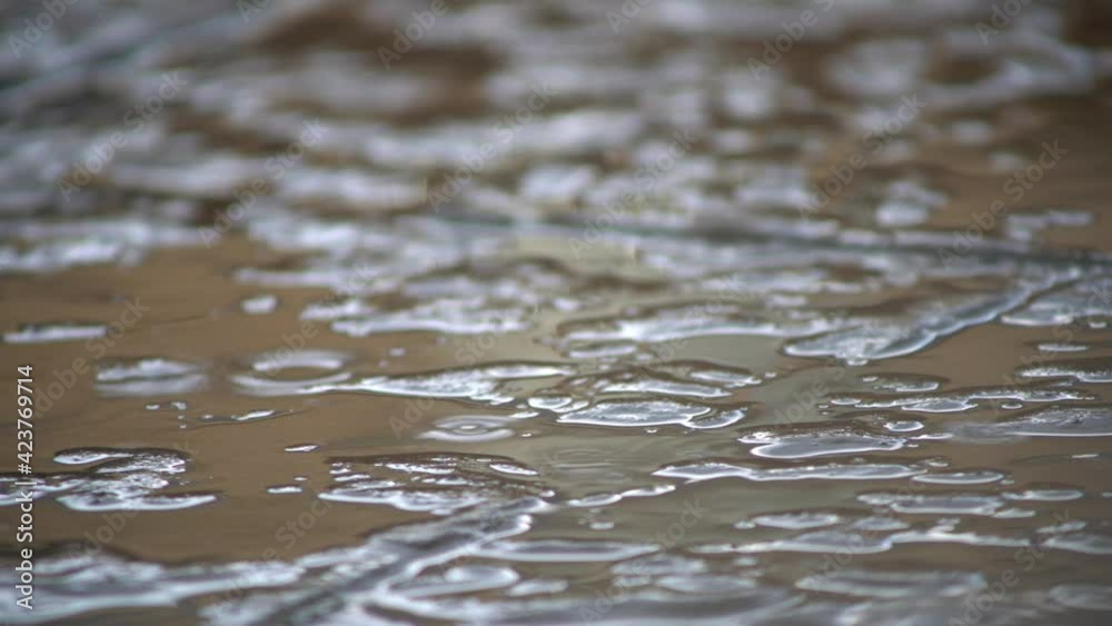 Raining outside on porch patio outside during rain storm and bad rainy ...