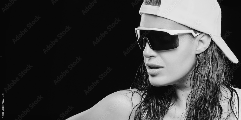 Monochrome closeup of the face of a sporty attractive woman with modern ...