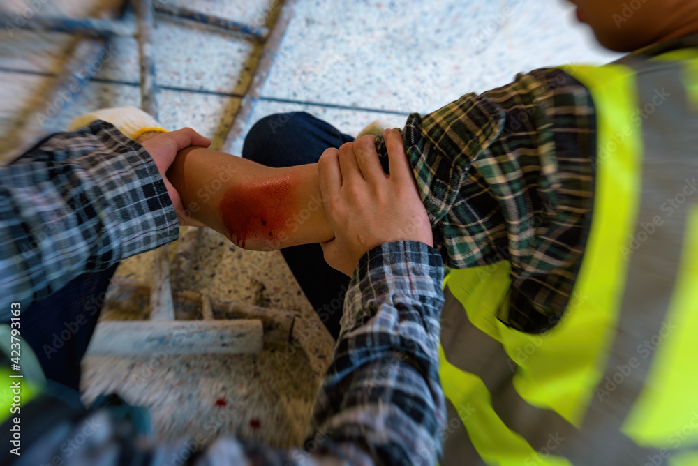 Injury bleeding from work accident in pile of scaffolding steel falling ...