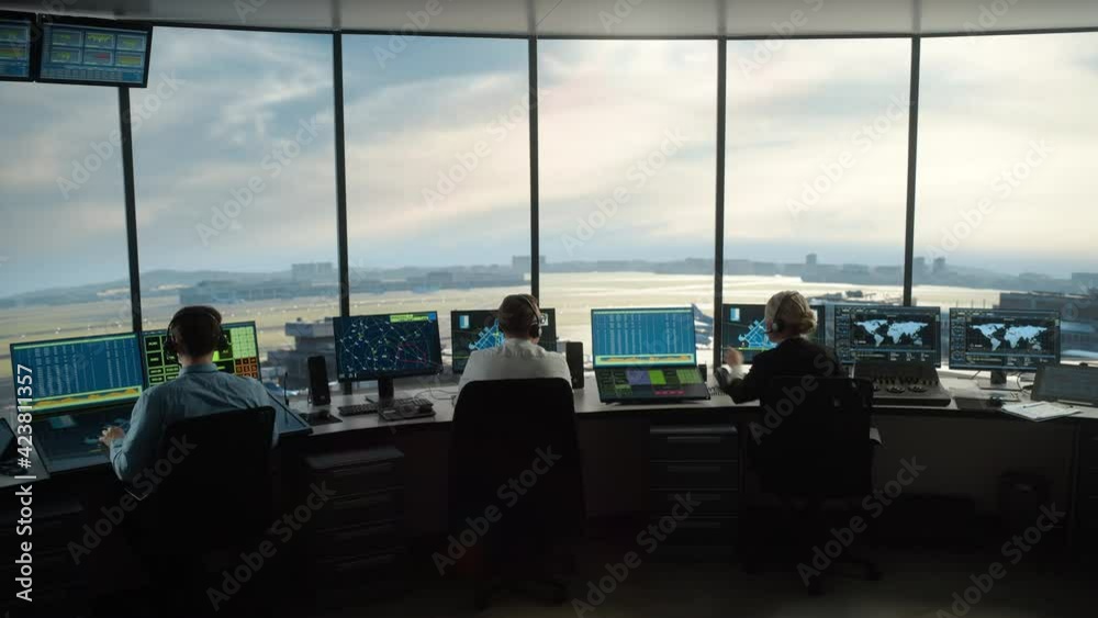 Diverse Air Traffic Control Team Working in a Modern Airport Tower ...