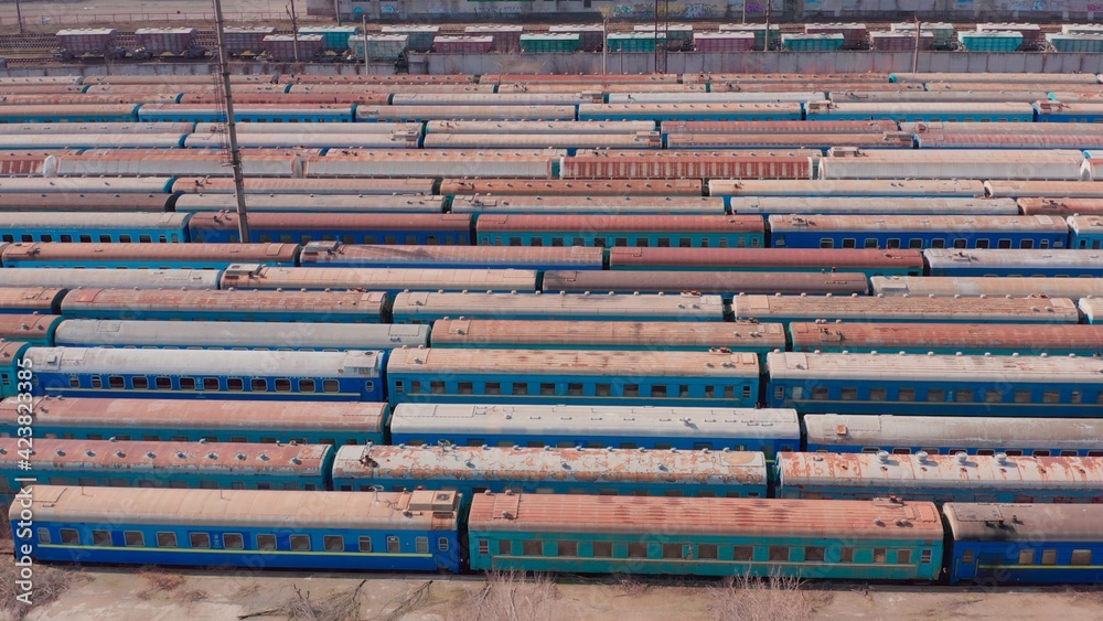 Railway hub showing passenger old crusty trains on tracks next to each ...